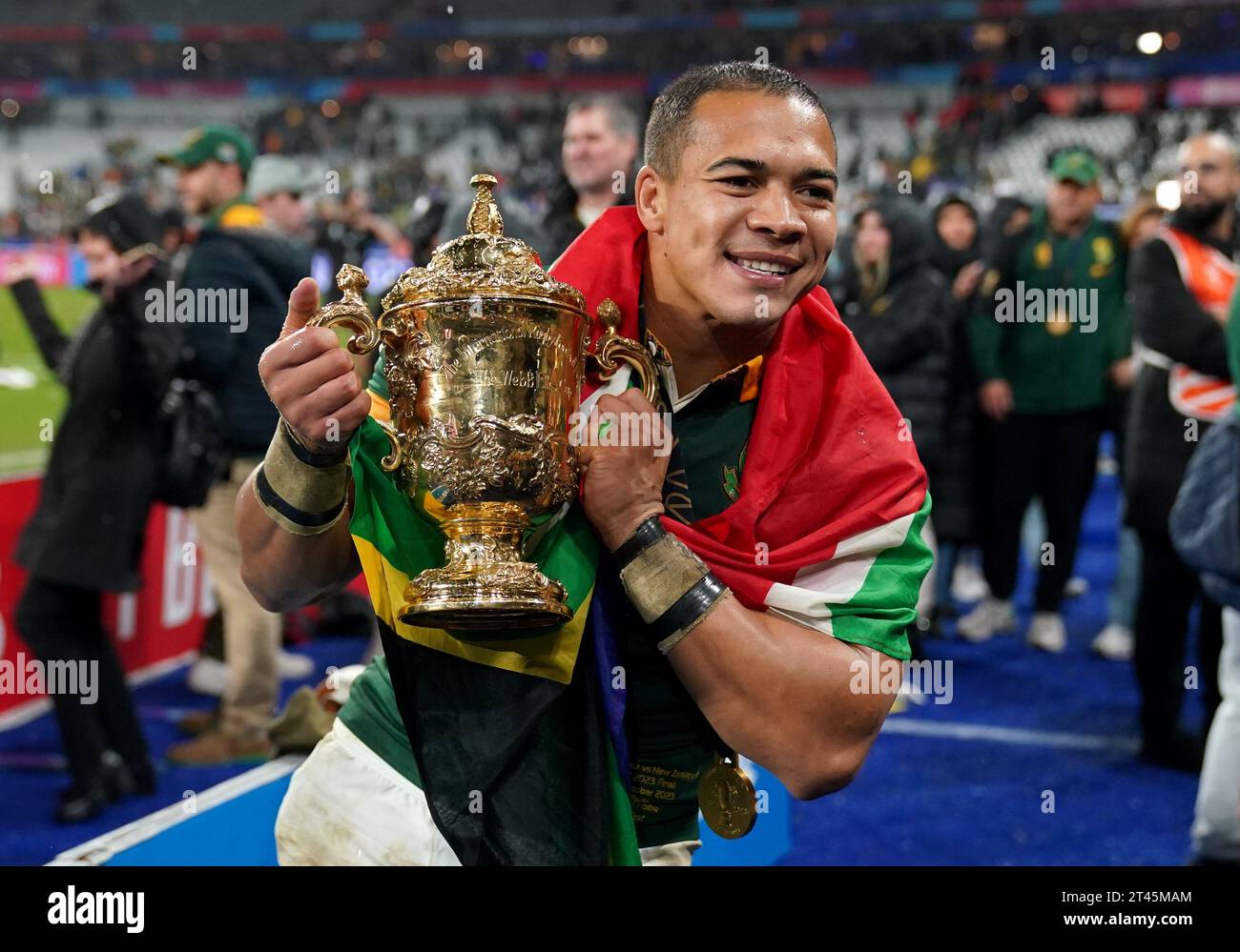 South Africa's Cheslin Kolbe celebrates with the Webb Ellis Cup ...