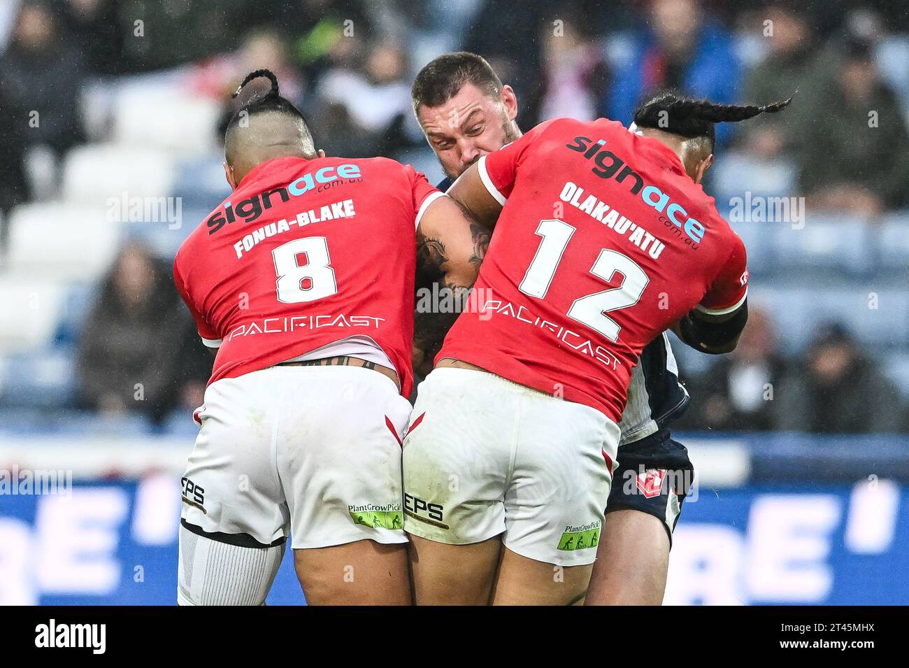 Elliott Whitehead of England is tackled by Addin Fonua -Blake of Tonga ...