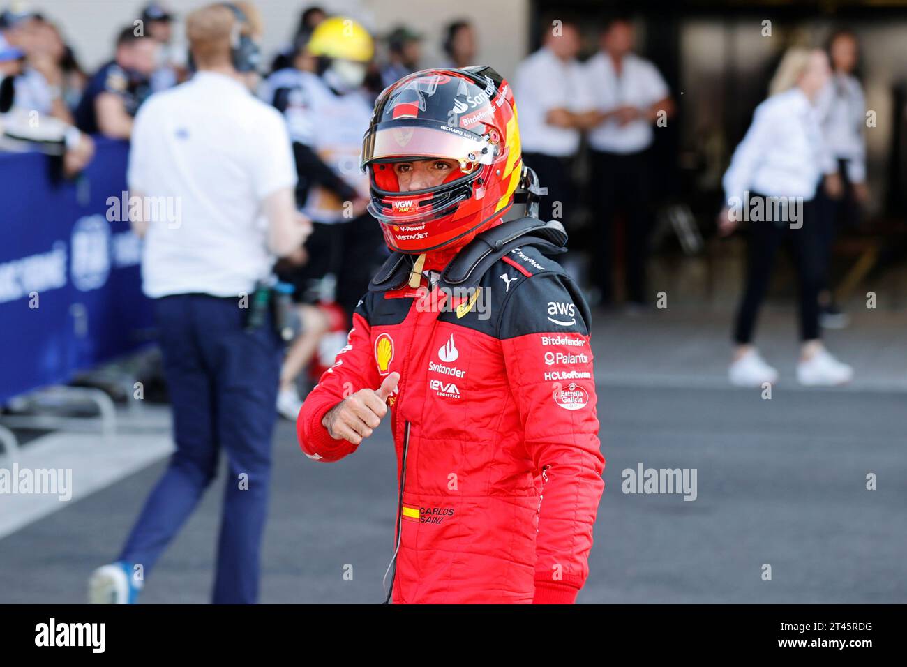 Ferrari's Carlos Sainz, of Spain, gives a thumbs up after the pole ...