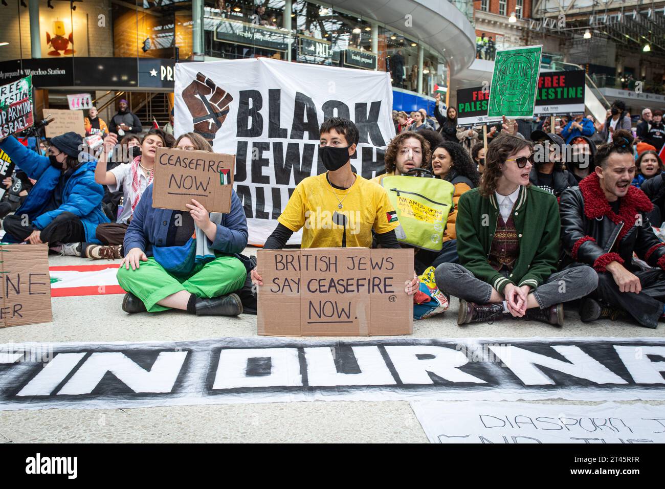 London, UK. 28th Oct, 2023. Pro Palestine demonstrators block the ...