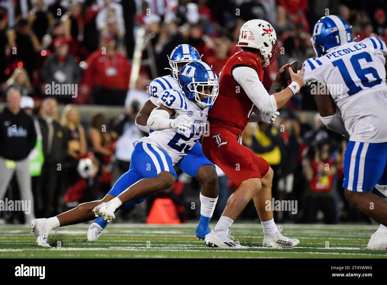 Duke safety Terry Moore (23) sacks Louisville quarterback Jack Plummer ...