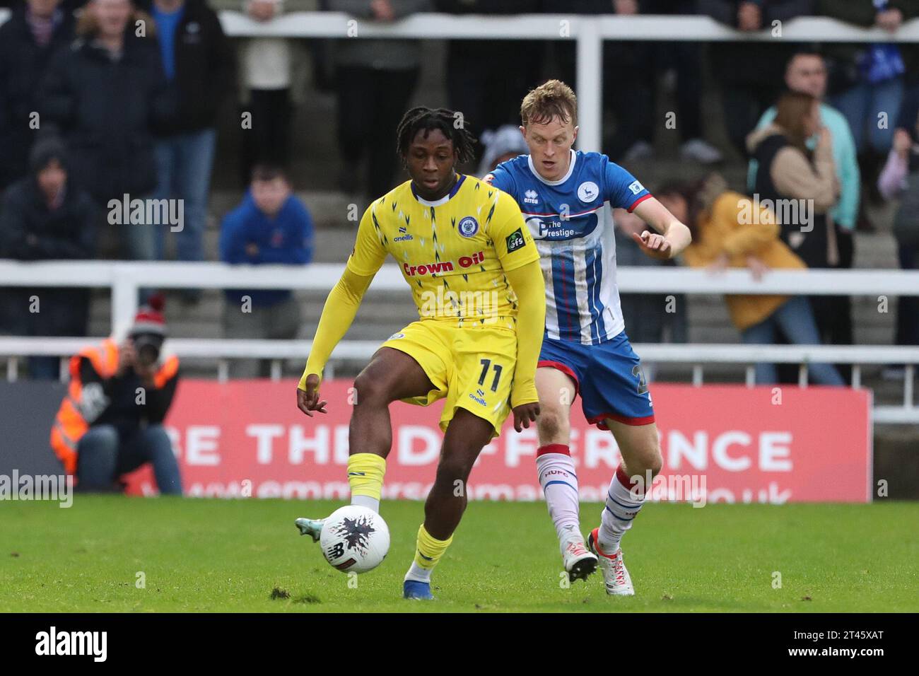 Jesurun Uchegbulam of Rochdale in action with Luke Hendrie of ...