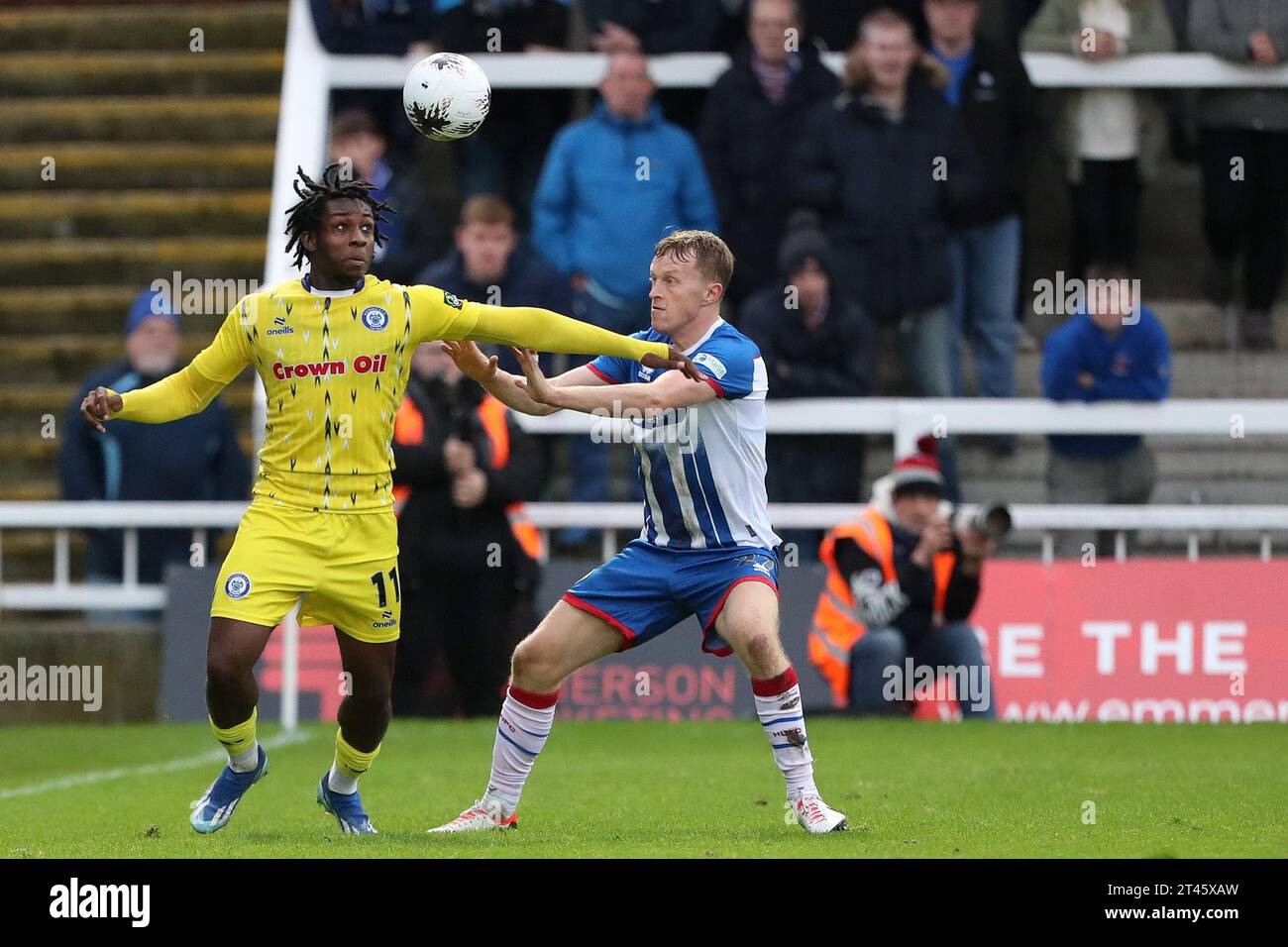 Jesurun Uchegbulam of Rochdale in action with Luke Hendrie of ...