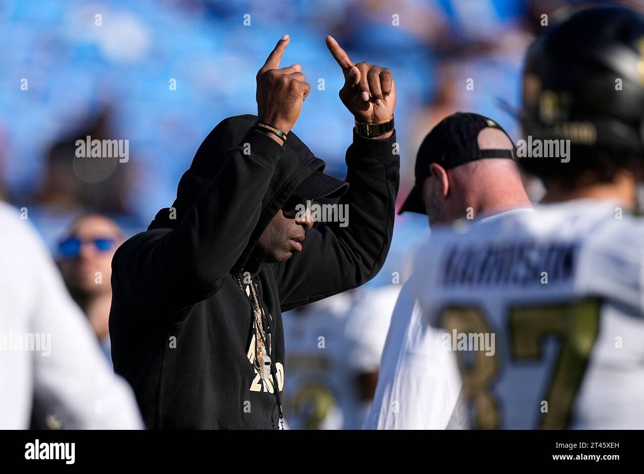 Colorado head coach Deion Sanders gestures to his team prior to an NCAA ...