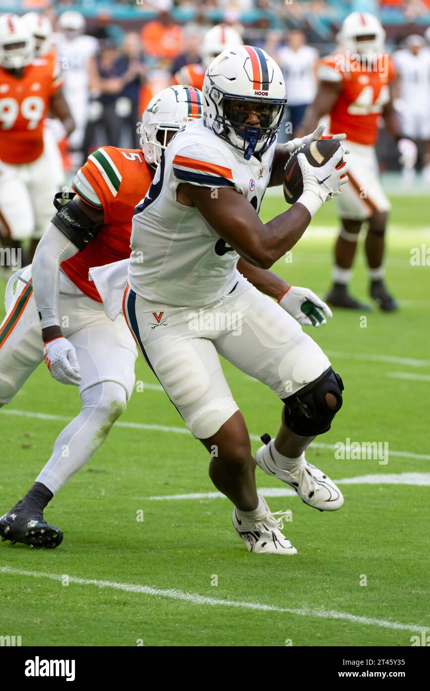 MIAMI GARDENS, FL - OCTOBER 28: Virginia tight end Joshua Rawlings (89) runs with the ball ...