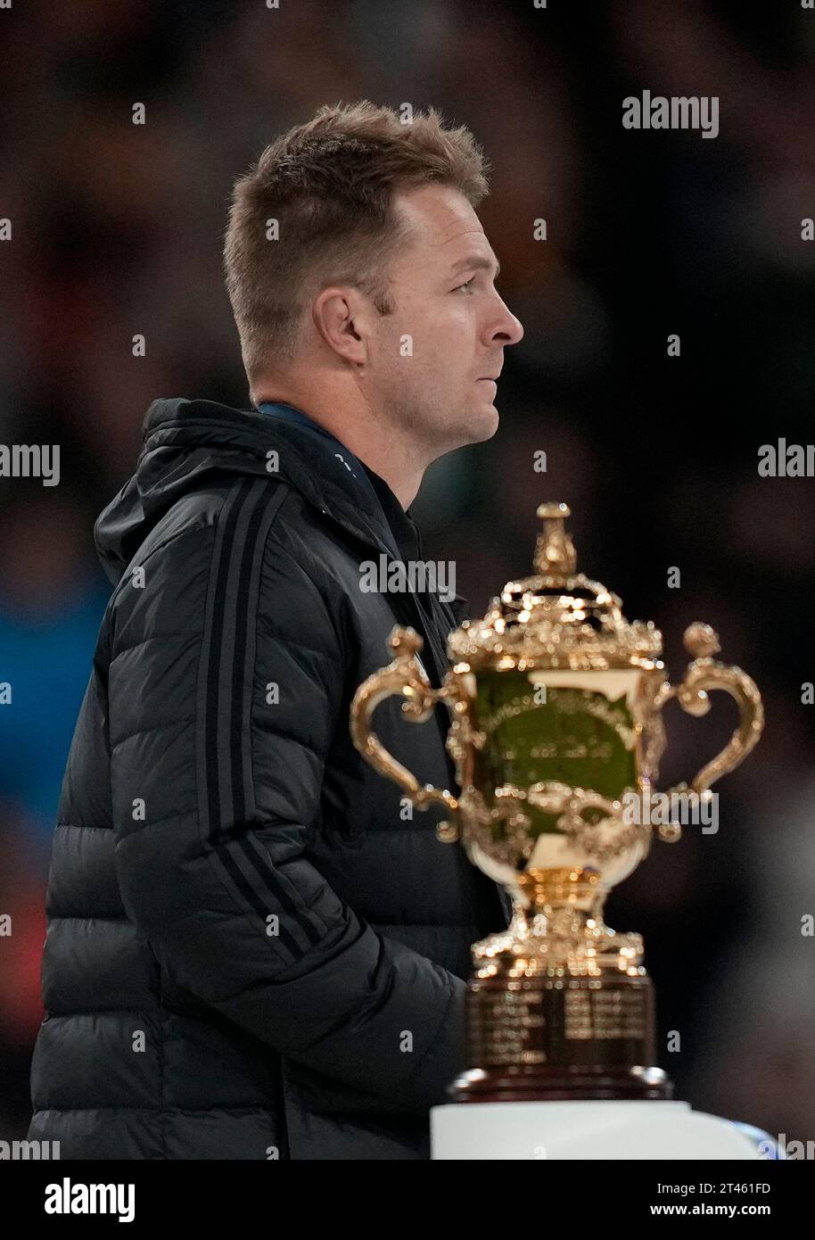 New Zealand's Sam Cane walks past the trophy during presentation ...