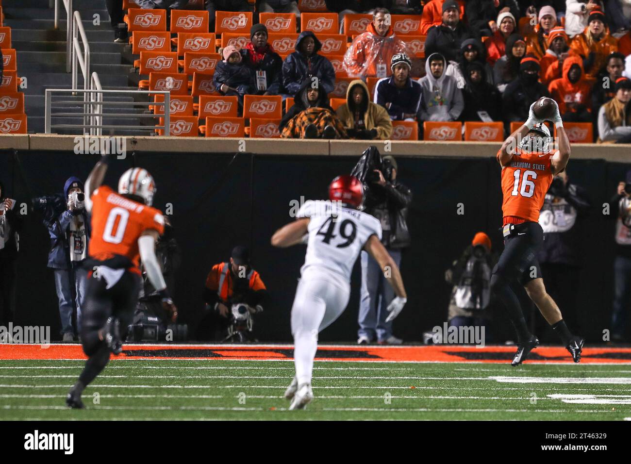 Oklahoma State's Josiah Johnson catches a touchdown pass during the ...