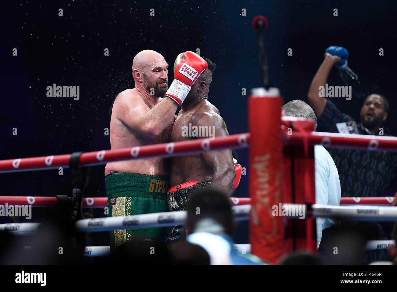 Tyson Fury, of England, the WBC and lineal heavyweight champion, left ...