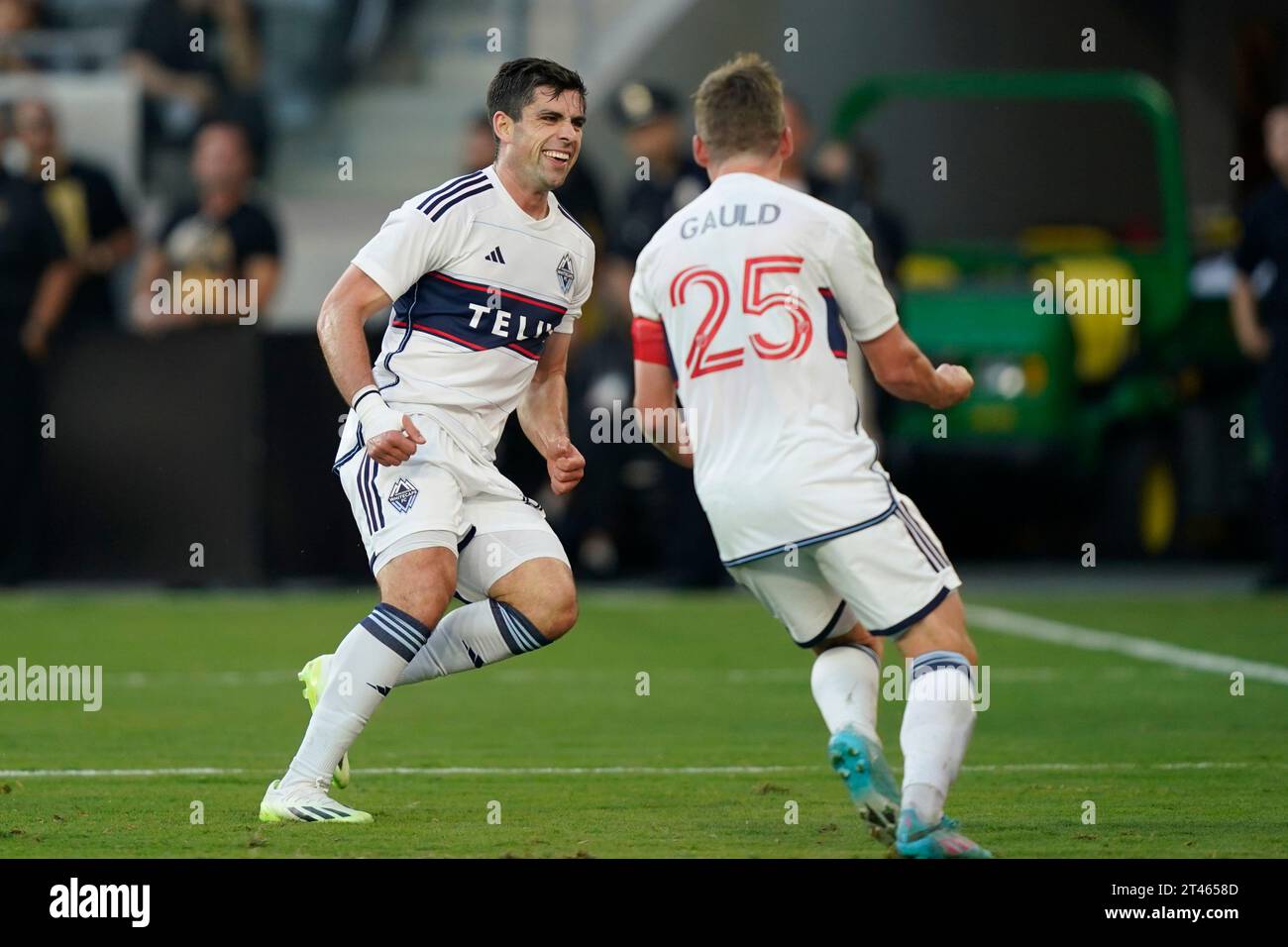 Vancouver Whitecaps forward Brian White, left, celebrates his goal ...