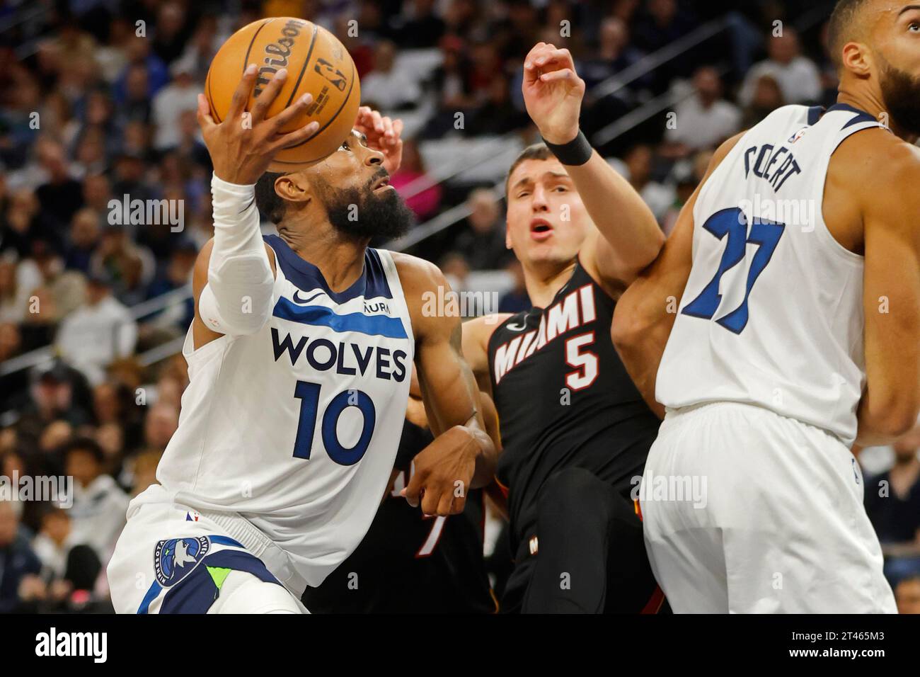 Minnesota Timberwolves guard Mike Conley (10) drives to the basket past ...