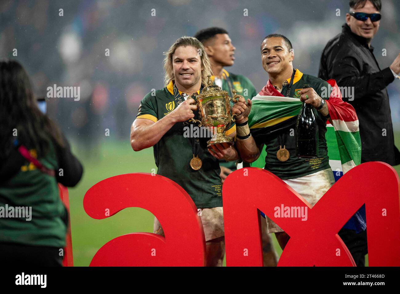 Faf De Klerk and Cheslin Kolbe celebrate after winning the Rugby World ...
