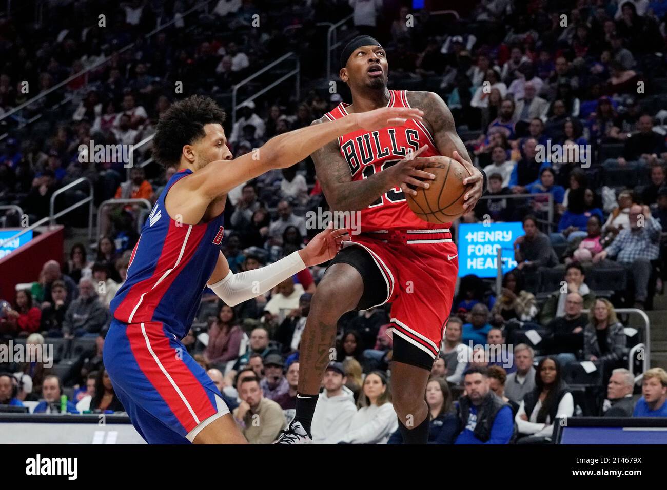 Detroit Pistons guard Cade Cunningham (2) reaches in on Chicago Bulls ...