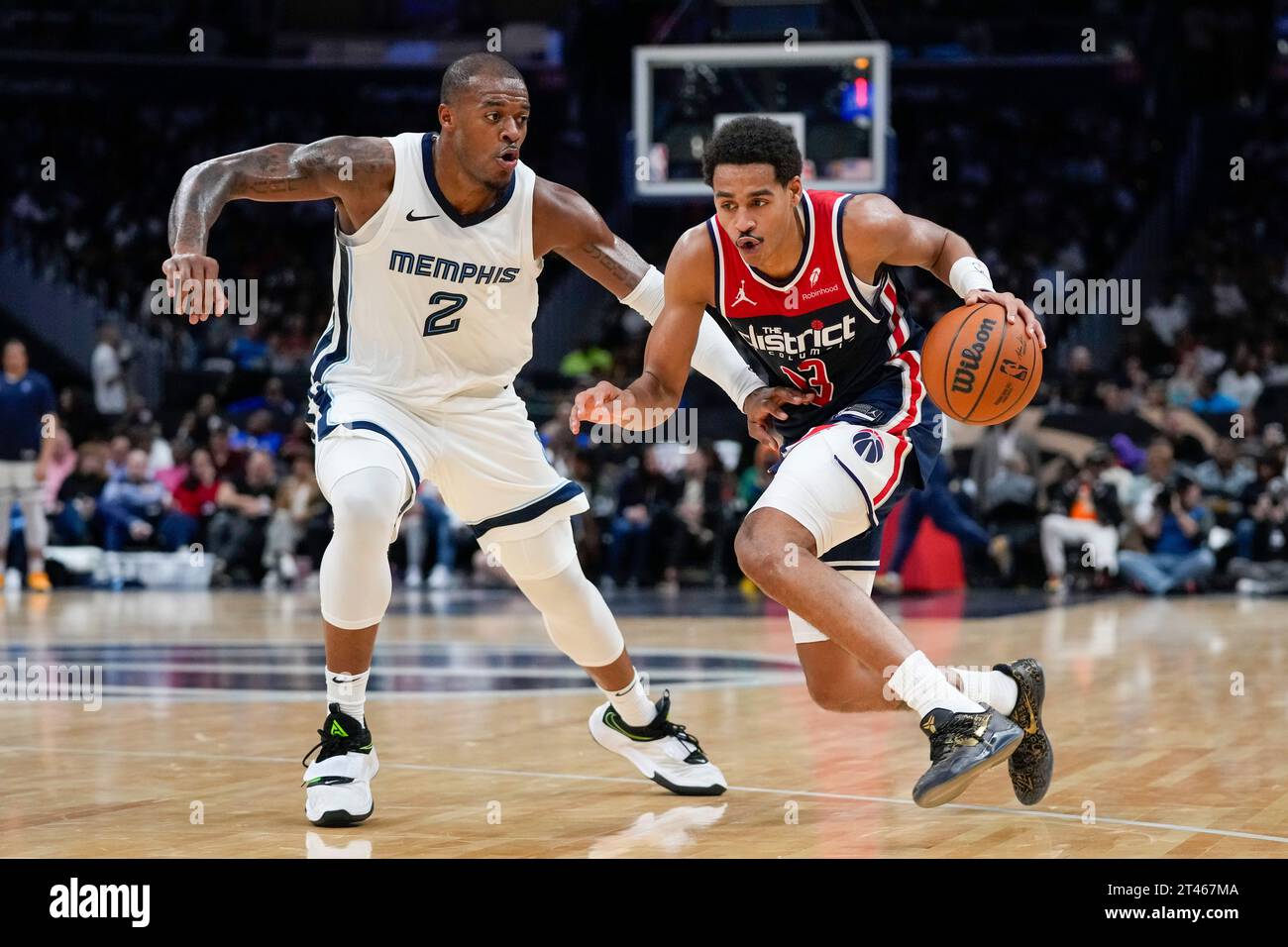 Washington Wizards guard Jordan Poole (13) drives past Memphis ...