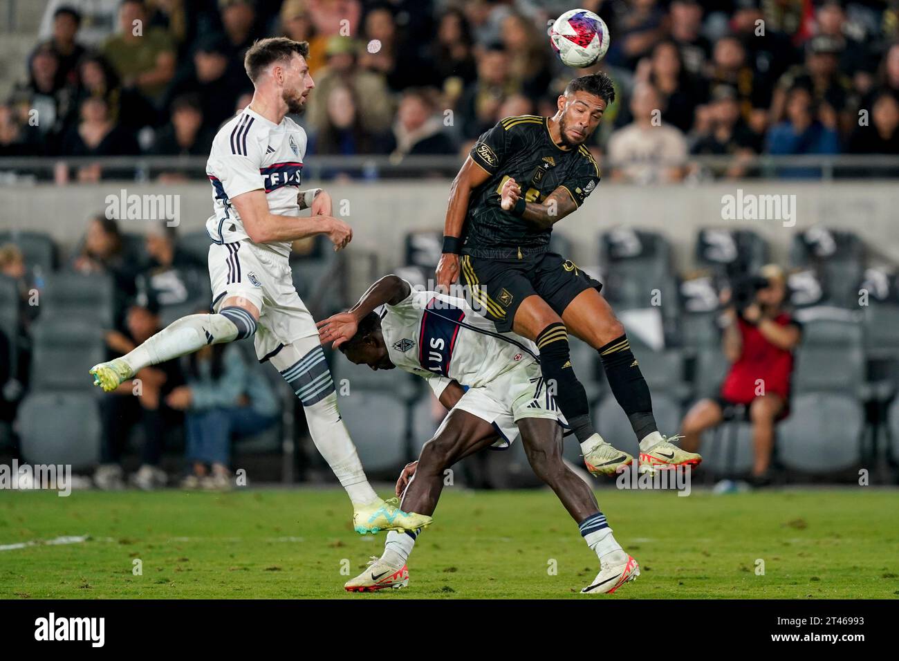 Los Angeles FC forward Denis Bouanga, top right, and Vancouver ...