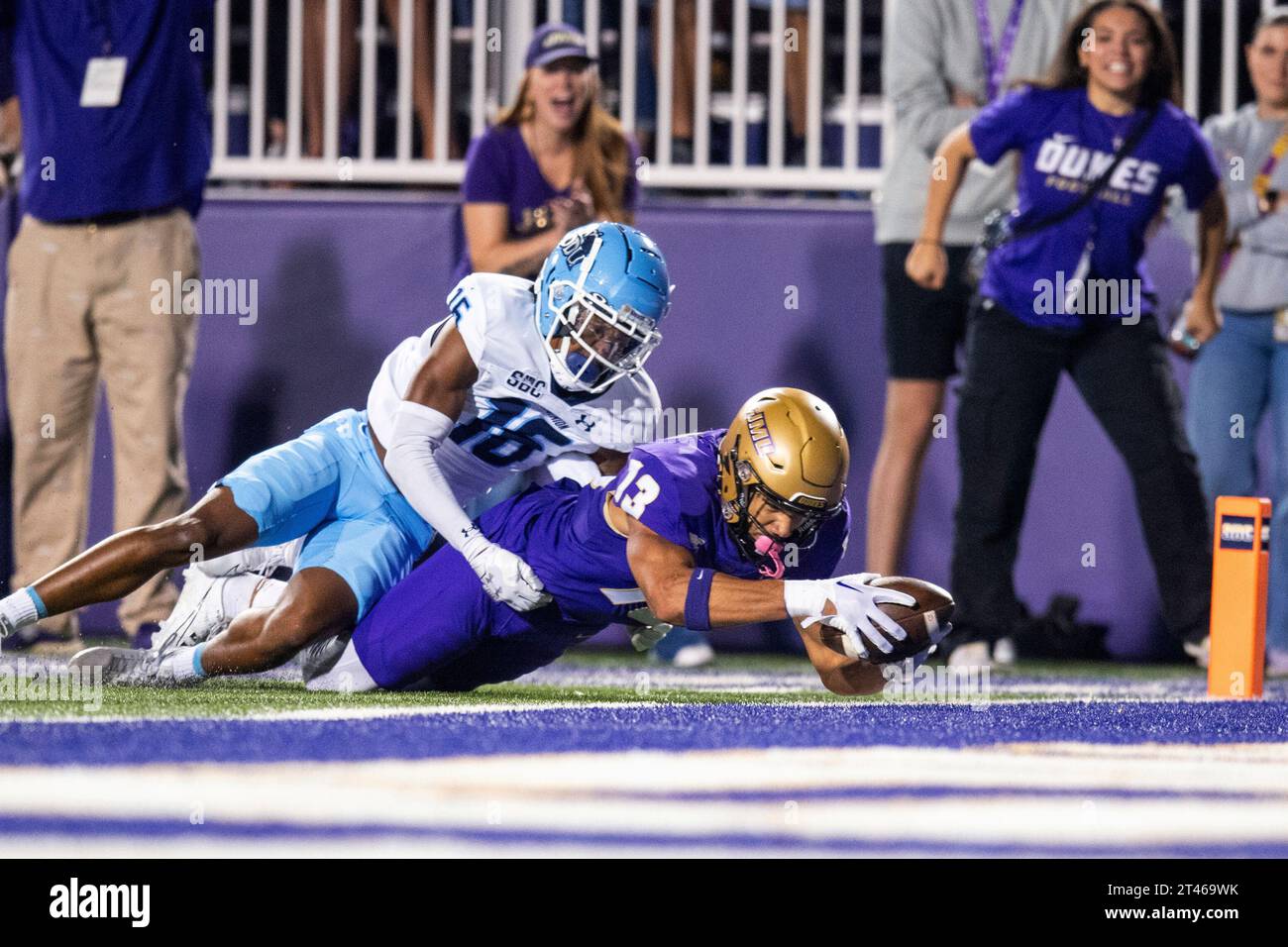 James Madison wide receiver Elijah Sarratt (13) is tackled by Old ...