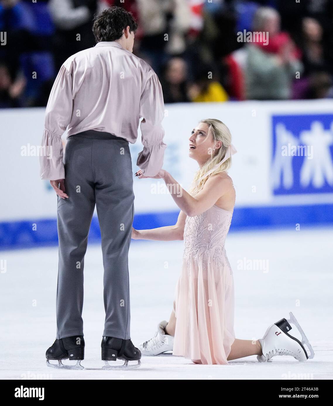 Piper Gilles and Paul Poirier of Canada skate during the ice dance free ...