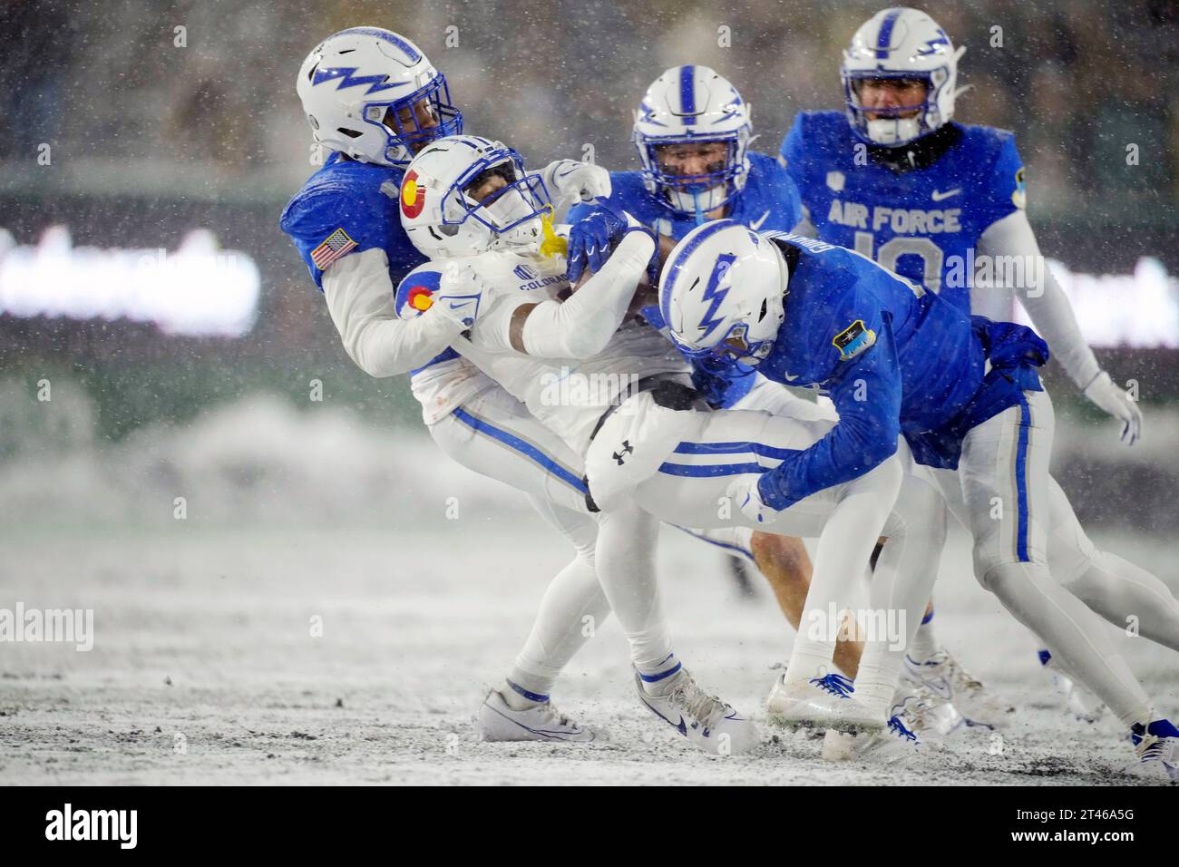 Colorado State wide receiver Tory Horton, second from left, is stopped ...
