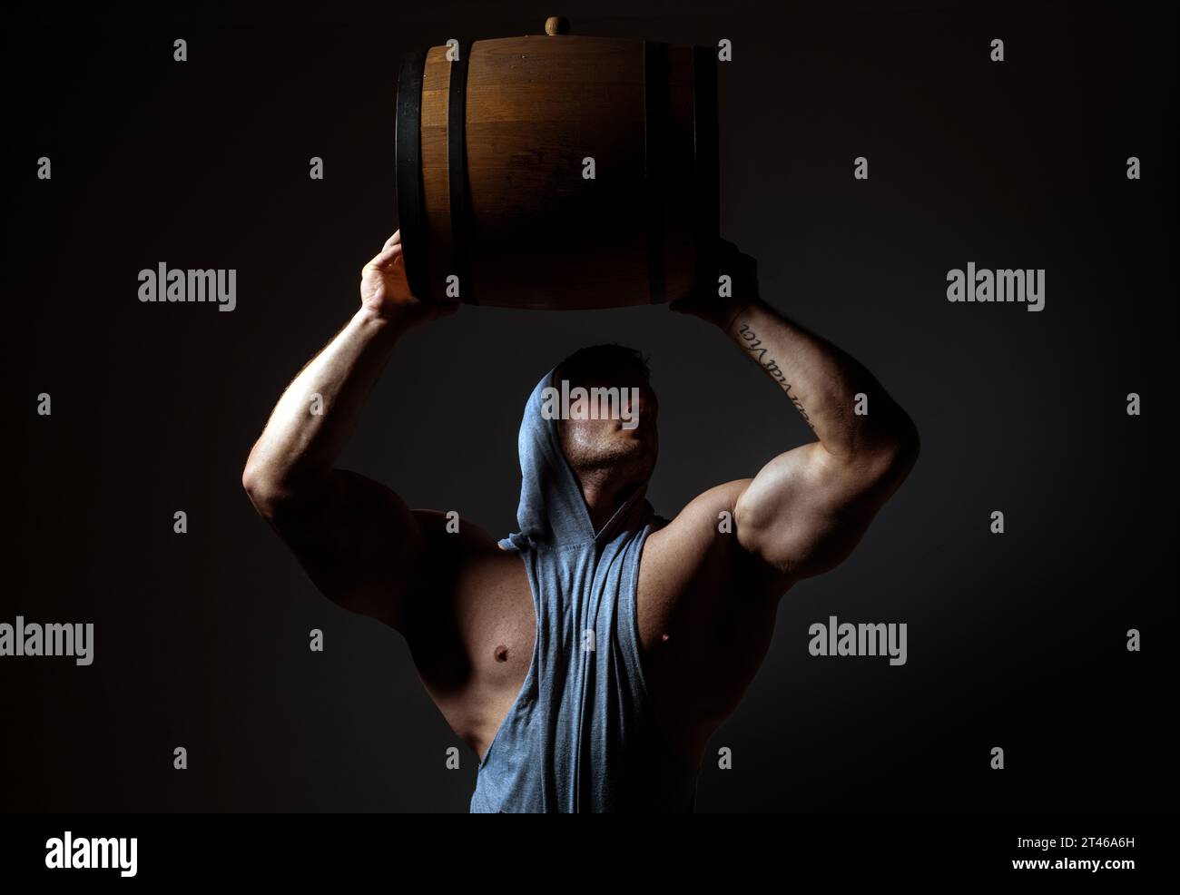 Man hold wooden barrel on black. Oktoberfest. Brewery concept. Big ...