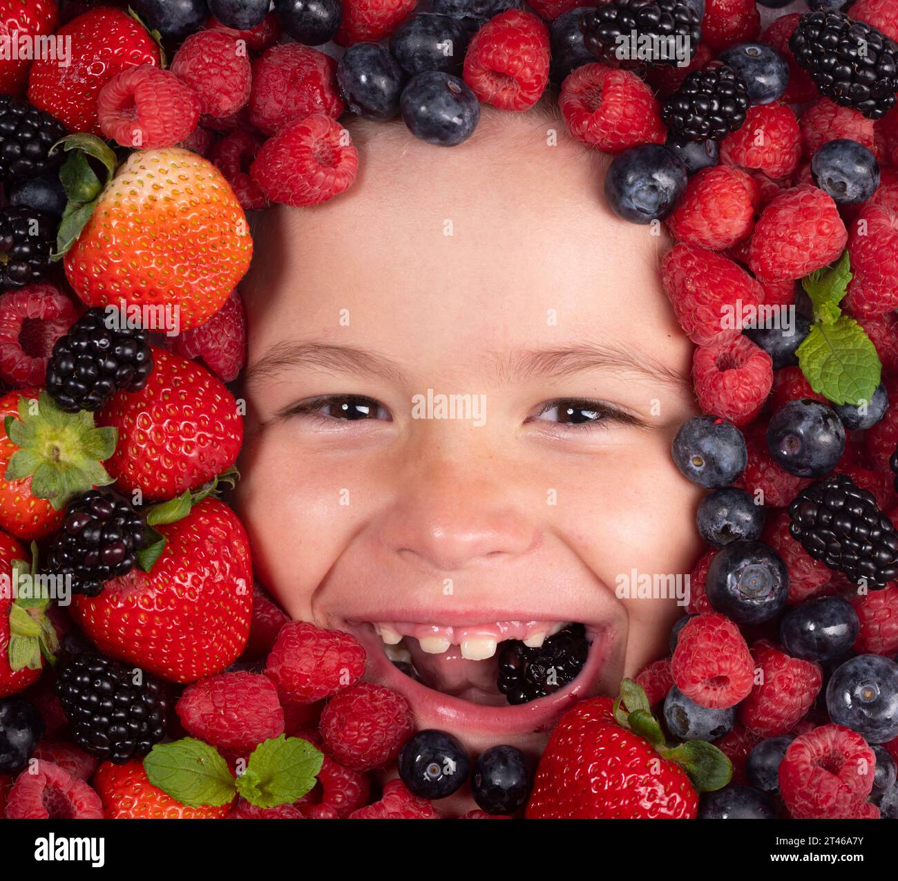 Healthy eating for children. Strawberry, blueberry, raspberry ...