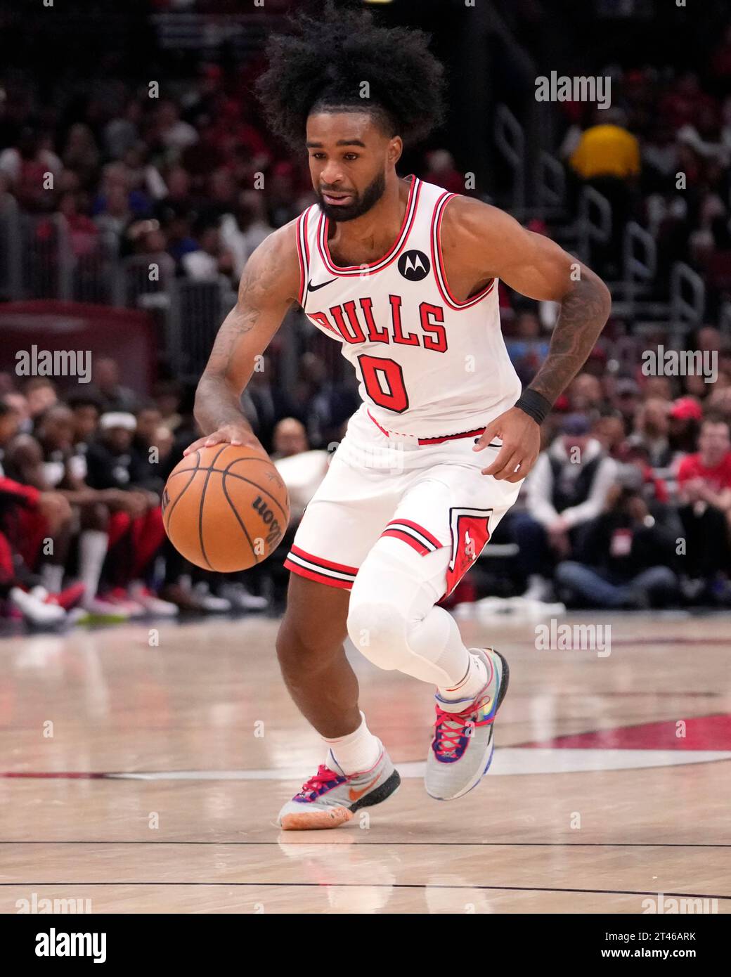 Chicago Bulls' Coby White drives to the basket during an NBA basketball ...