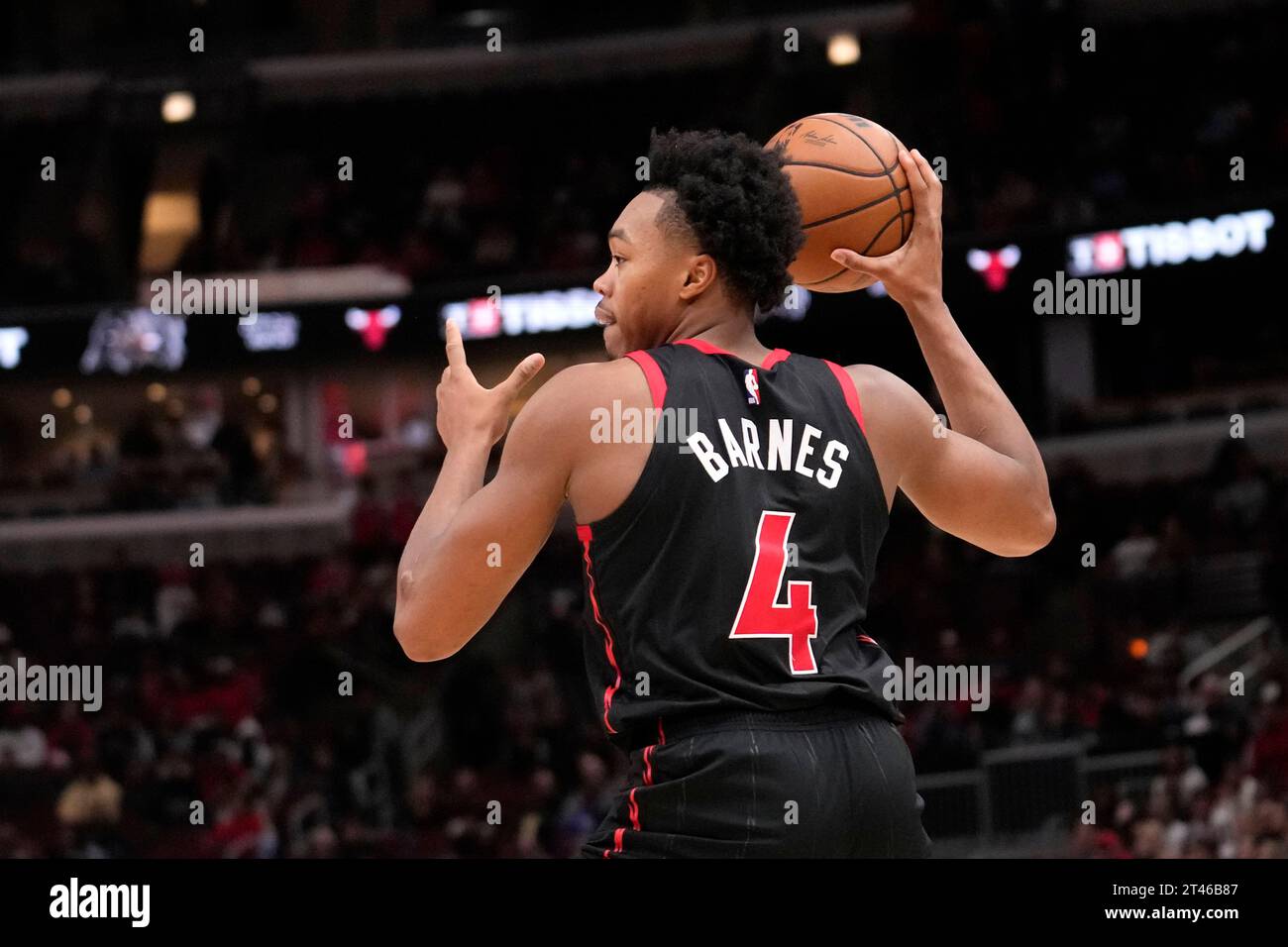 Toronto Raptors' Scottie Barnes passes in an NBA basketball game ...