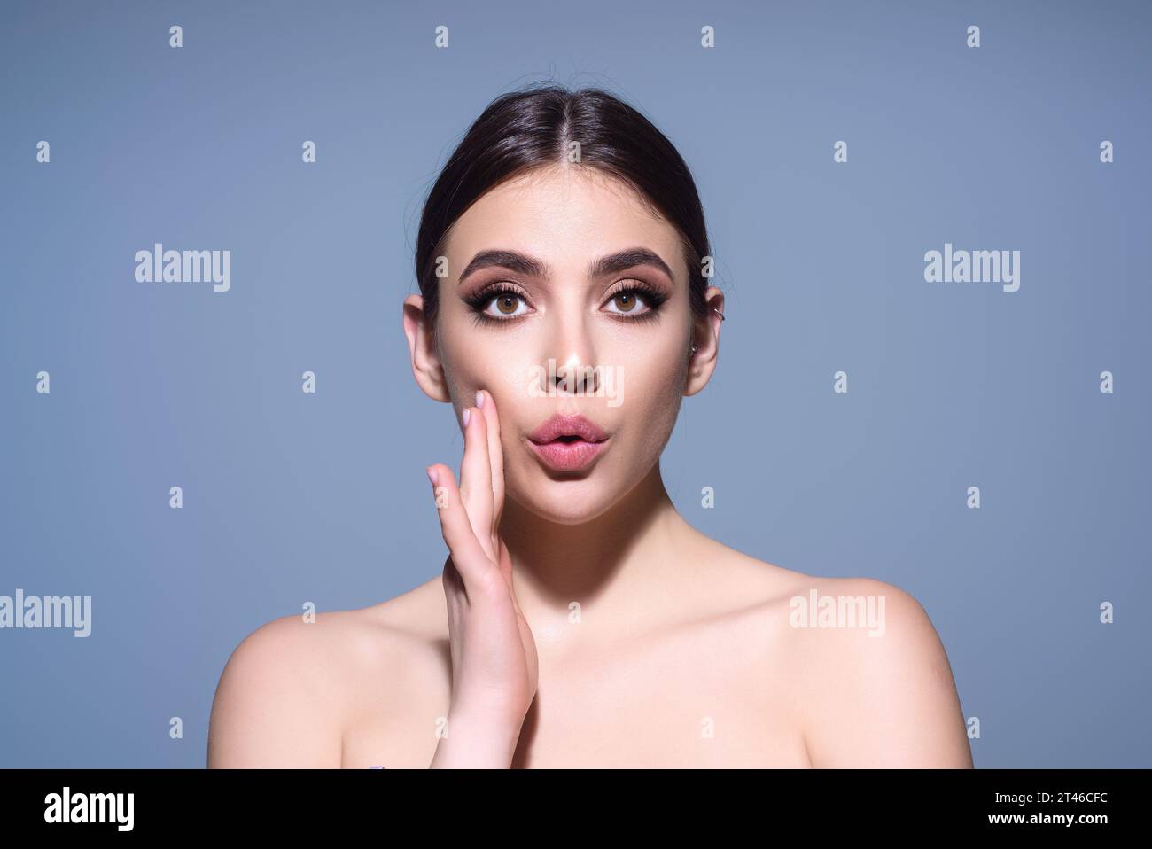 Girl raising eyebrows being surprised and shocked. Astonished reaction ...