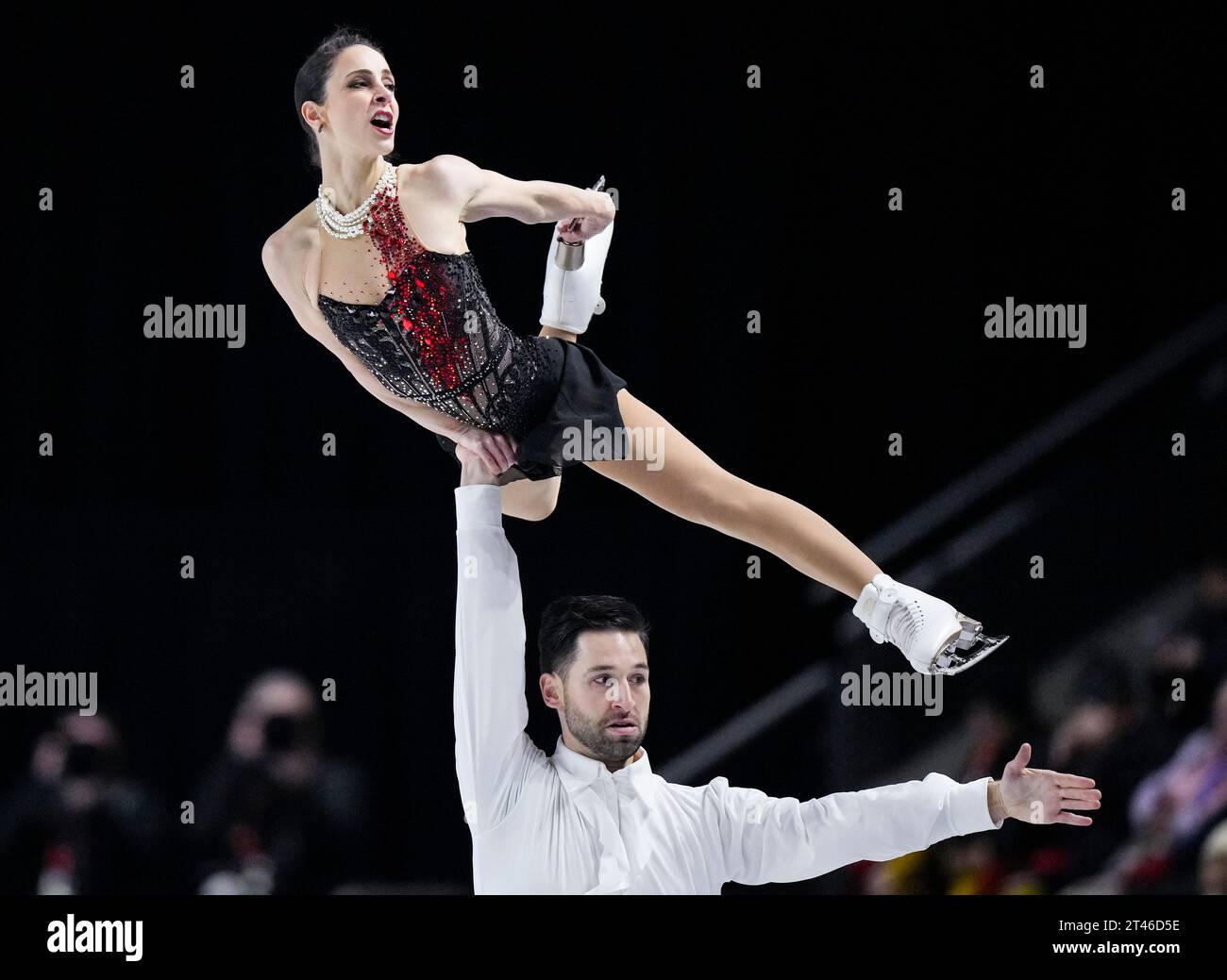 Deanna Stellato-Dudek and Maxime Deschamps of Canada skate during the ...