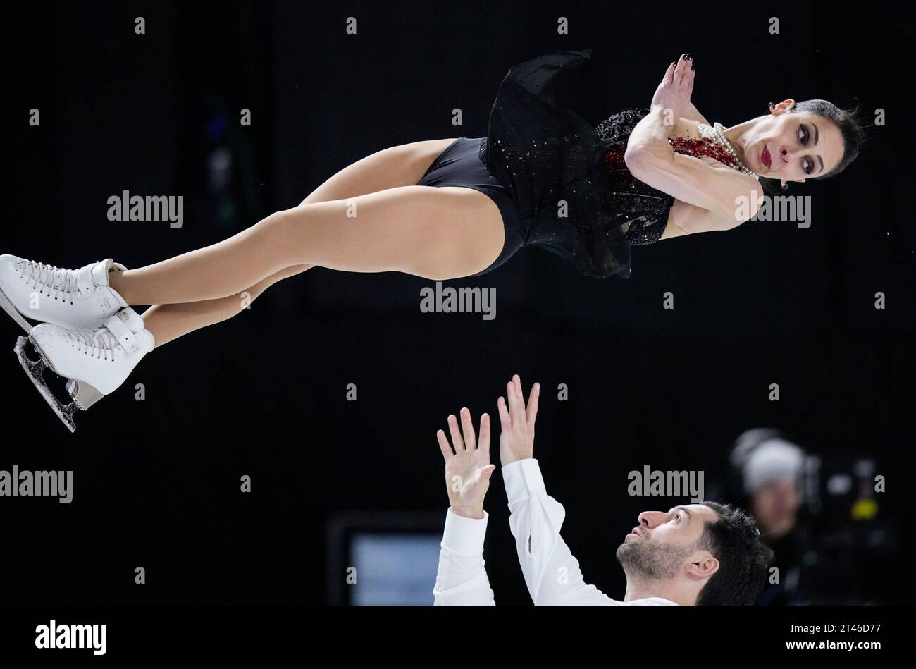 Deanna Stellato-Dudek and Maxime Deschamps of Canada skate during the ...