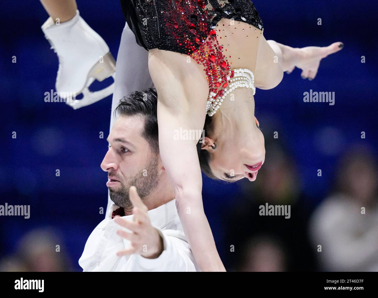 Deanna Stellato-Dudek and Maxime Deschamps of Canada skate during the ...