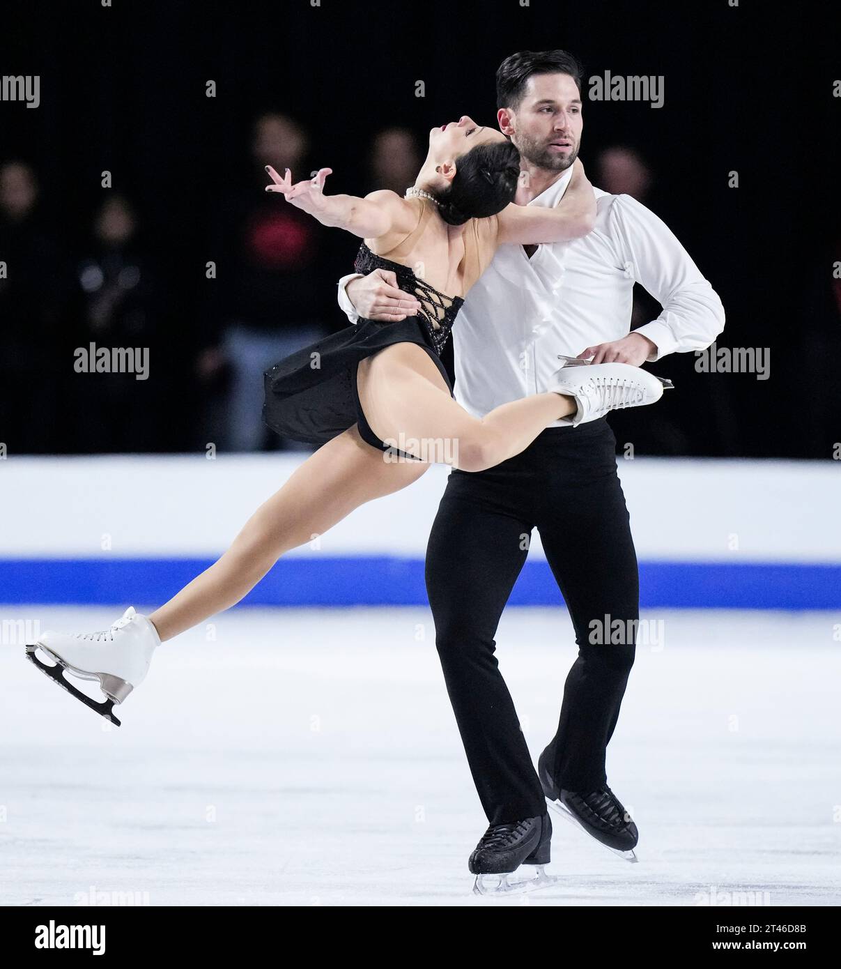 Deanna Stellato-Dudek and Maxime Deschamps of Canada skate during the ...