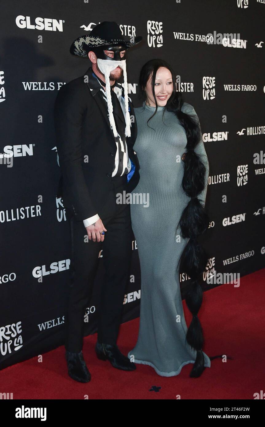 Orville Peck, left, and Noah Cyrus arrive at GLSEN's Rise Up benefit on ...