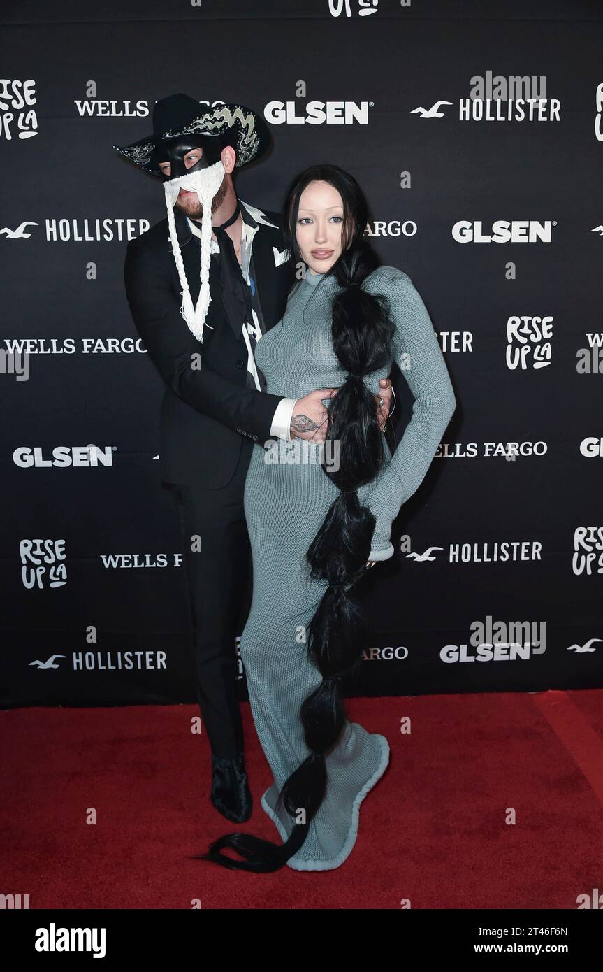 Orville Peck, left, and Noah Cyrus arrive at GLSEN's Rise Up benefit on ...