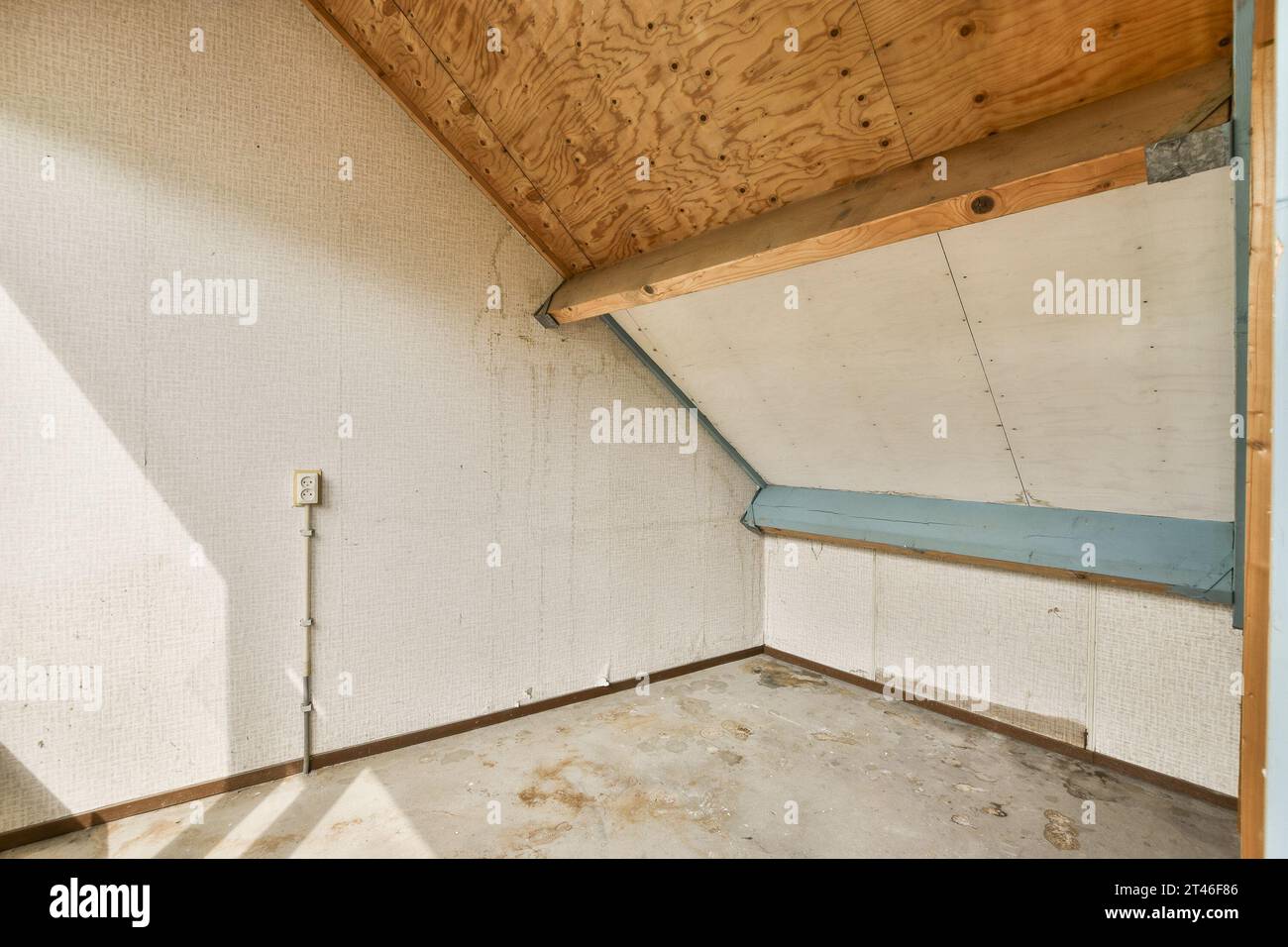 the inside of an unfinished room with wood paneling and white paint on ...