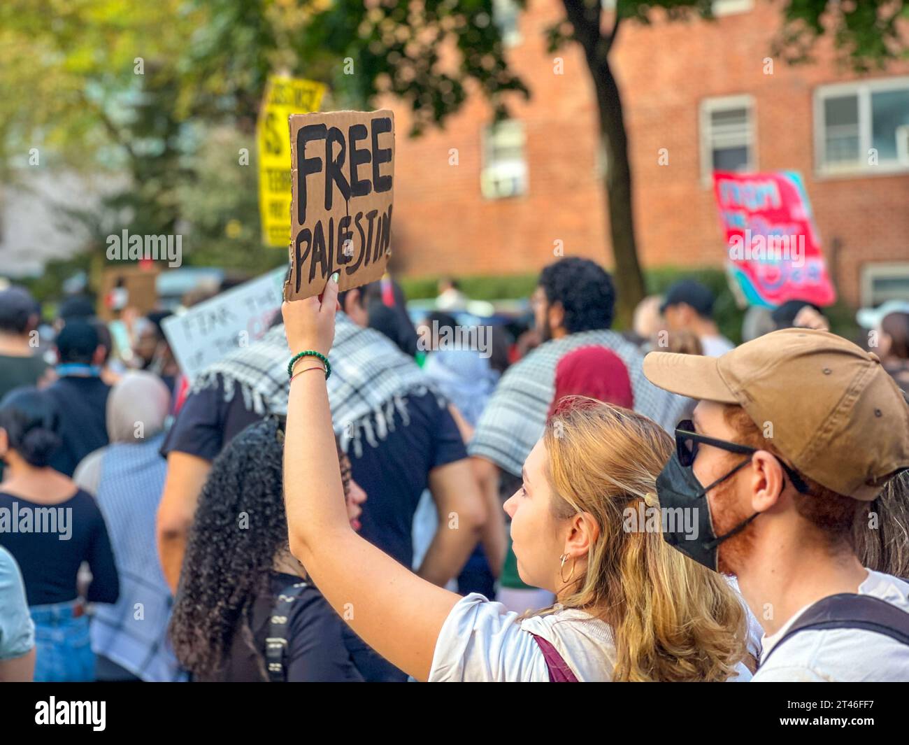 Brooklyn, New York, USA. 28th Oct, 2023. A demonstrator is seen holding ...
