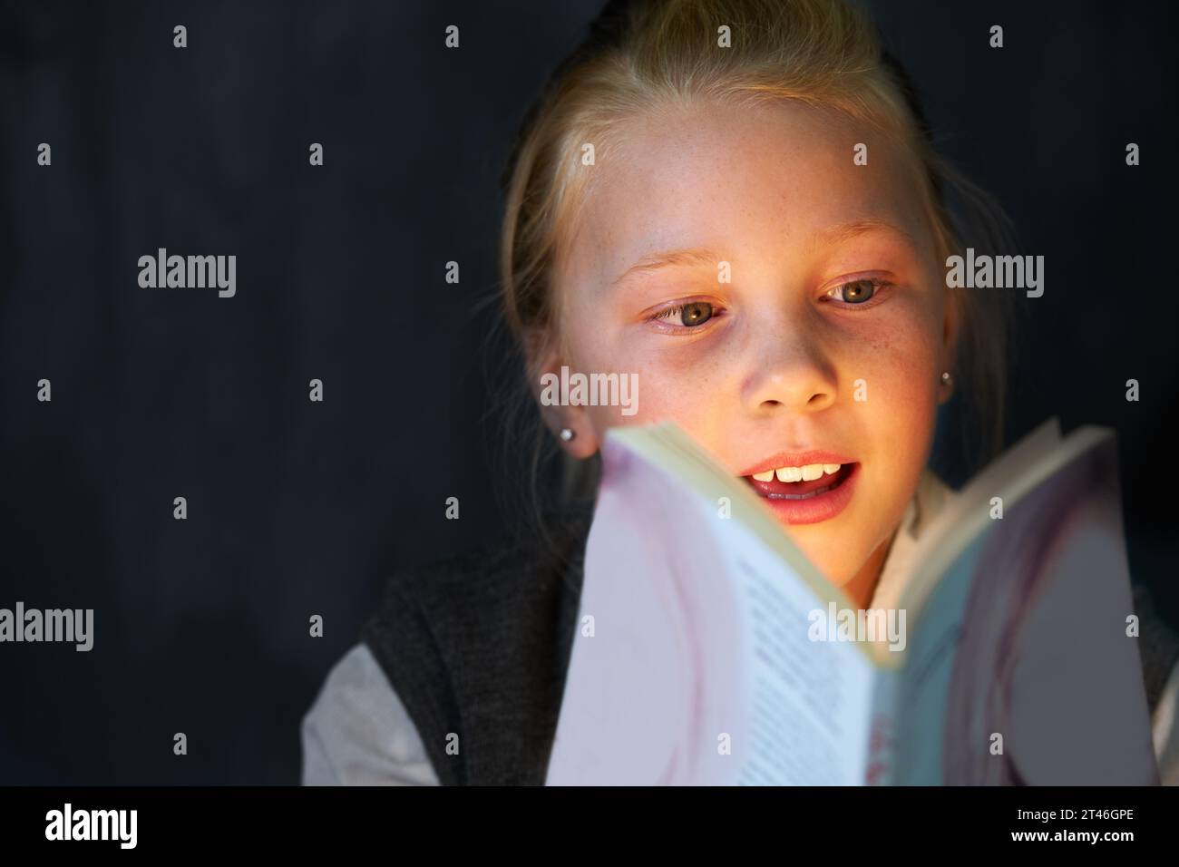 Smile, reading and child student with book in classroom for knowledge ...