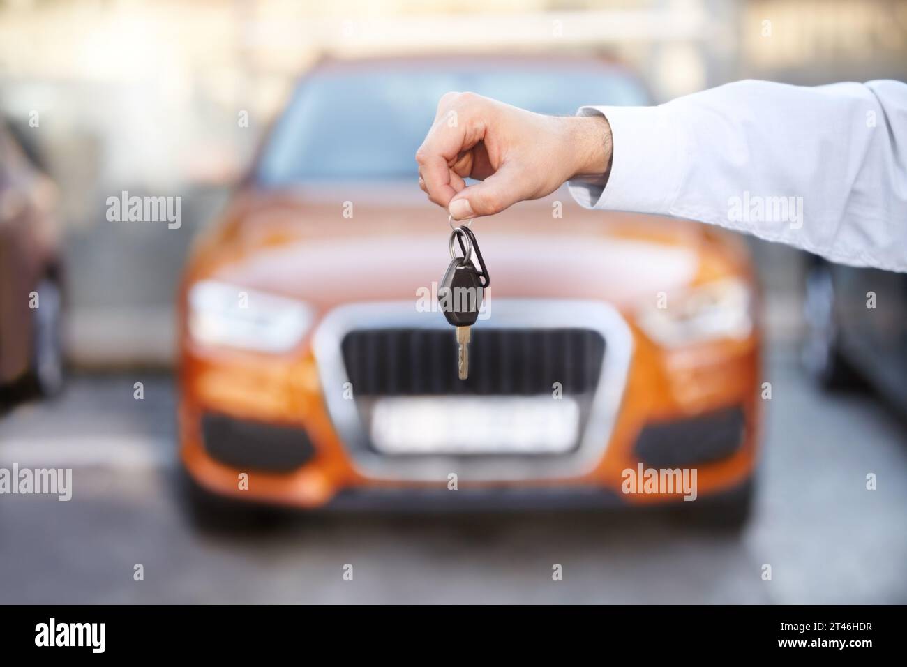 Car, outdoor and businessman with key in hand for sale of auto ...