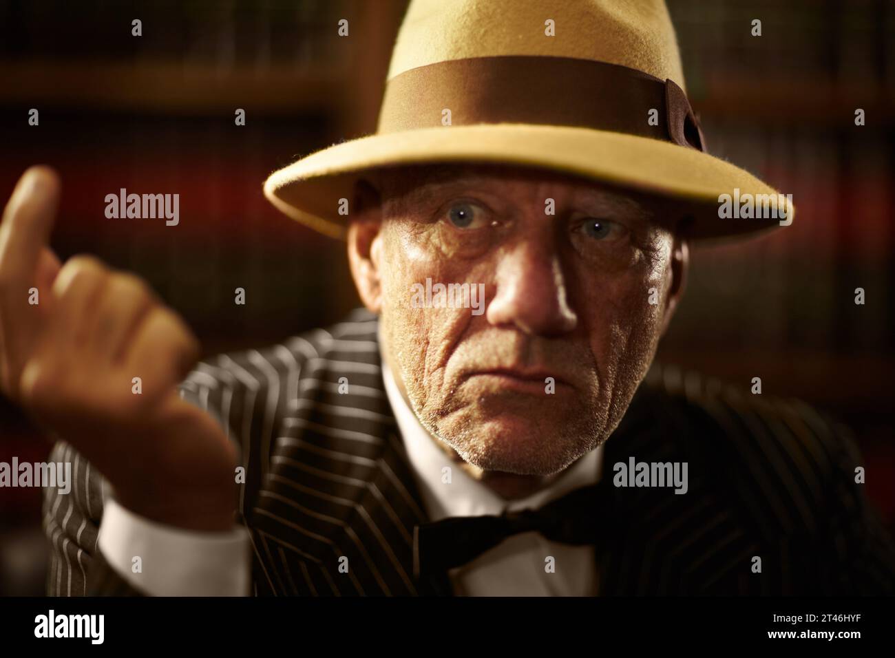 Mature, mafia and boss with serious look on face with fearless threat ...