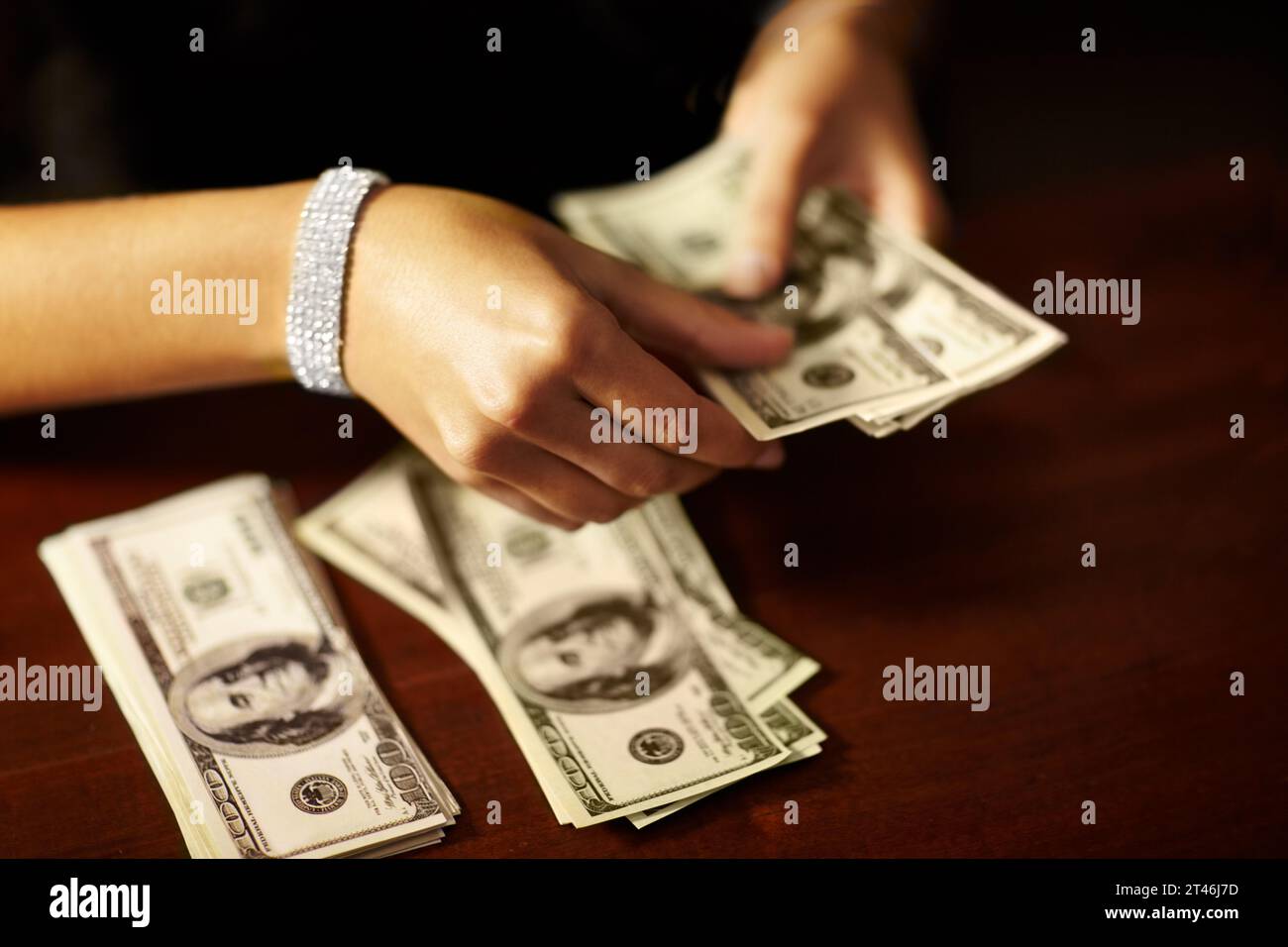 Women counting money cash notes hi-res stock photography and images - Alamy