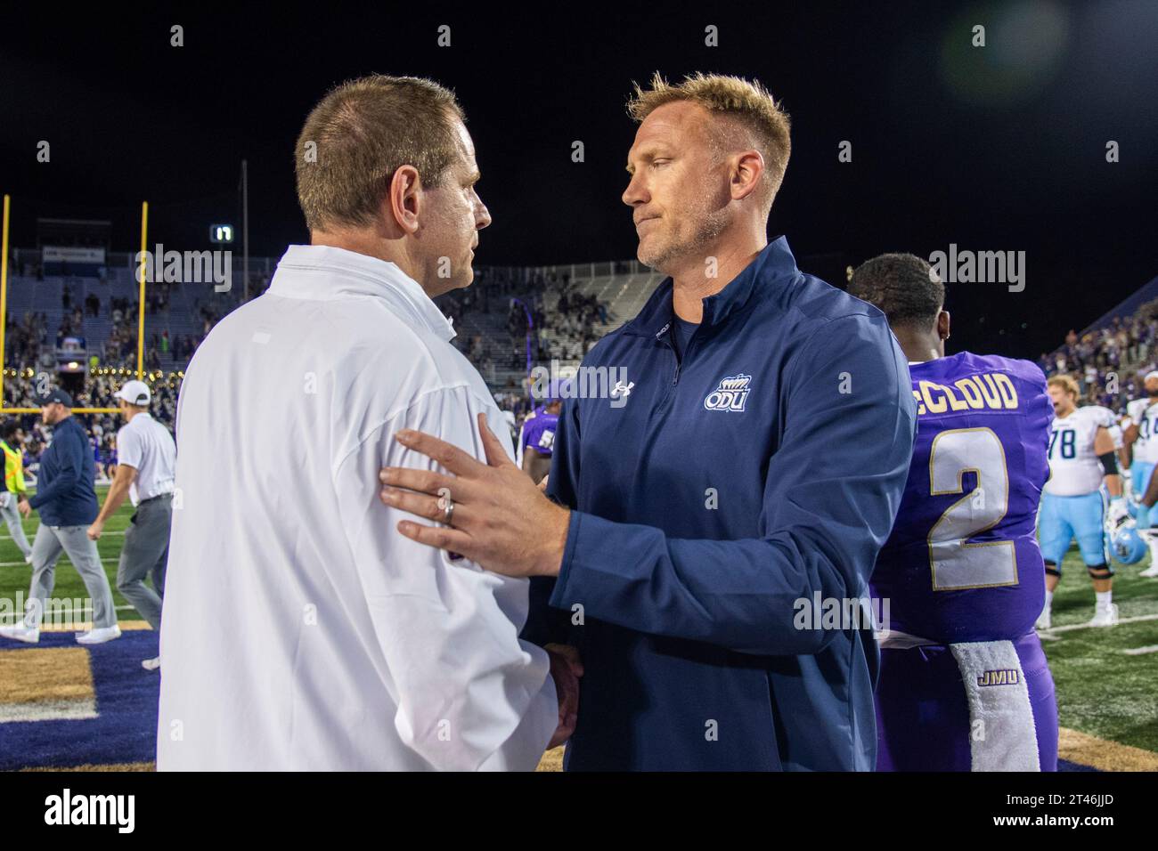 James Madison coach Curt Cignetti, left, meets with Old Dominion coach ...
