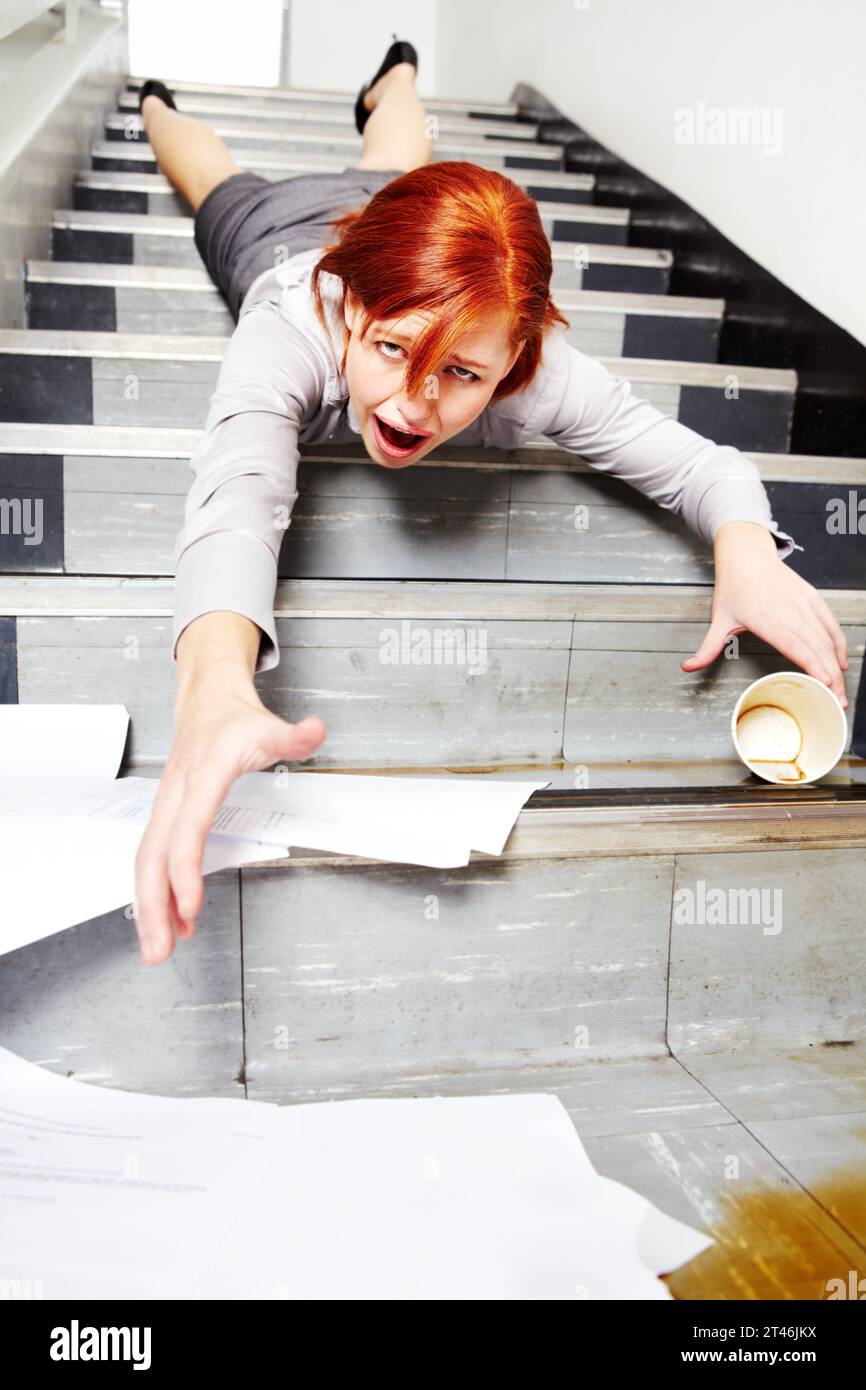 Woman falling down stairs hi-res stock photography and images - Alamy