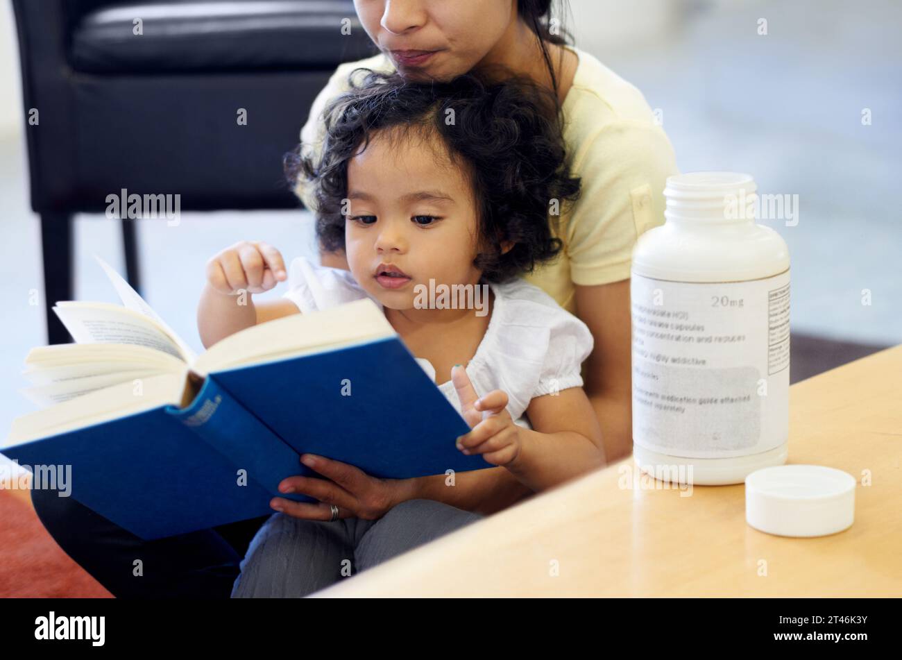 Mother, child and reading or book concentration pill bottle.adhd ...