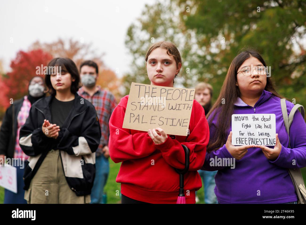 Bloomington, USA. 28th Oct, 2023. Protesters hold signs while gathering ...