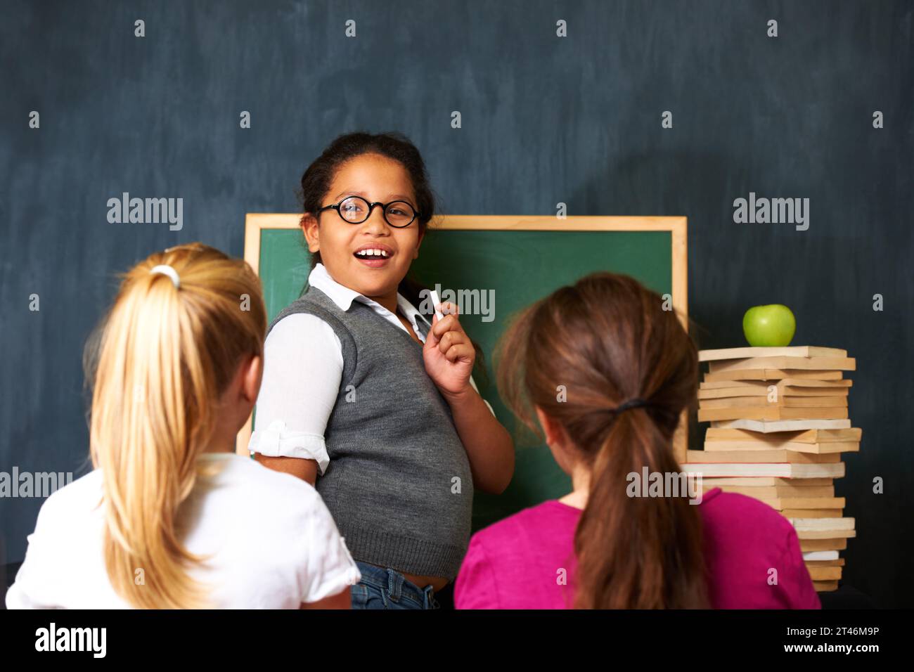 Teaching, smile and portrait of kid student by board for lesson ...
