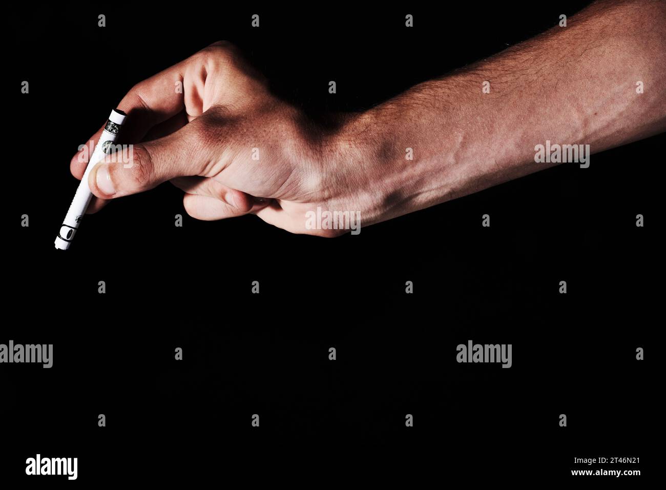 Hand, money roll and drugs, person on black background with addiction ...