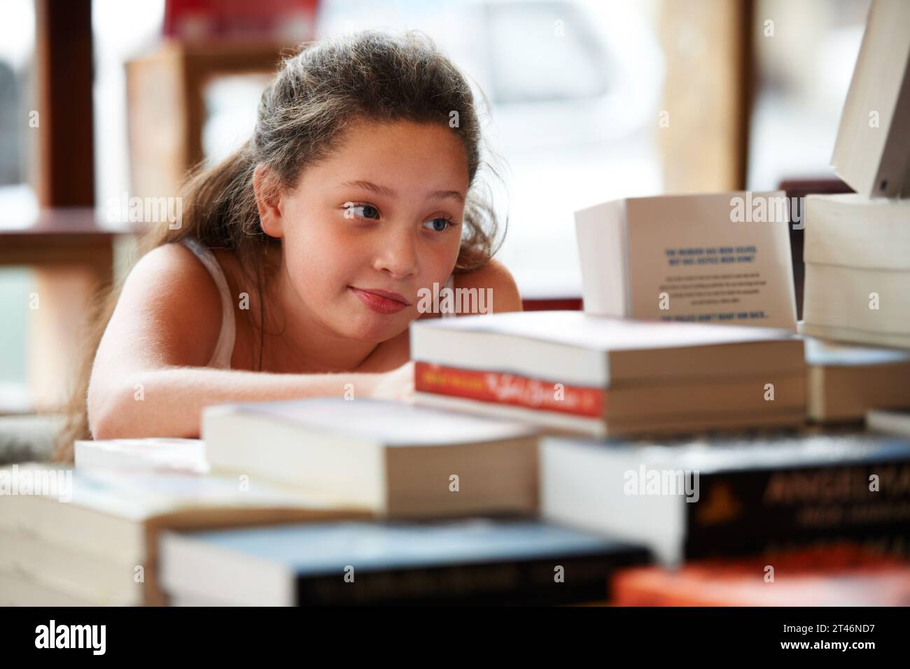 Girl child, books in library and education, story for knowledge or ...