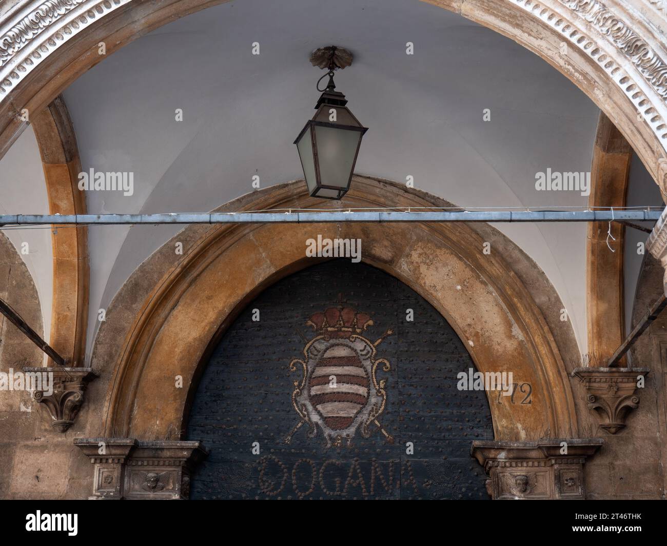 DUBROVNIK, CROATIA - SEPTEMBER 12, 2023: Coat of arms on door of the ...