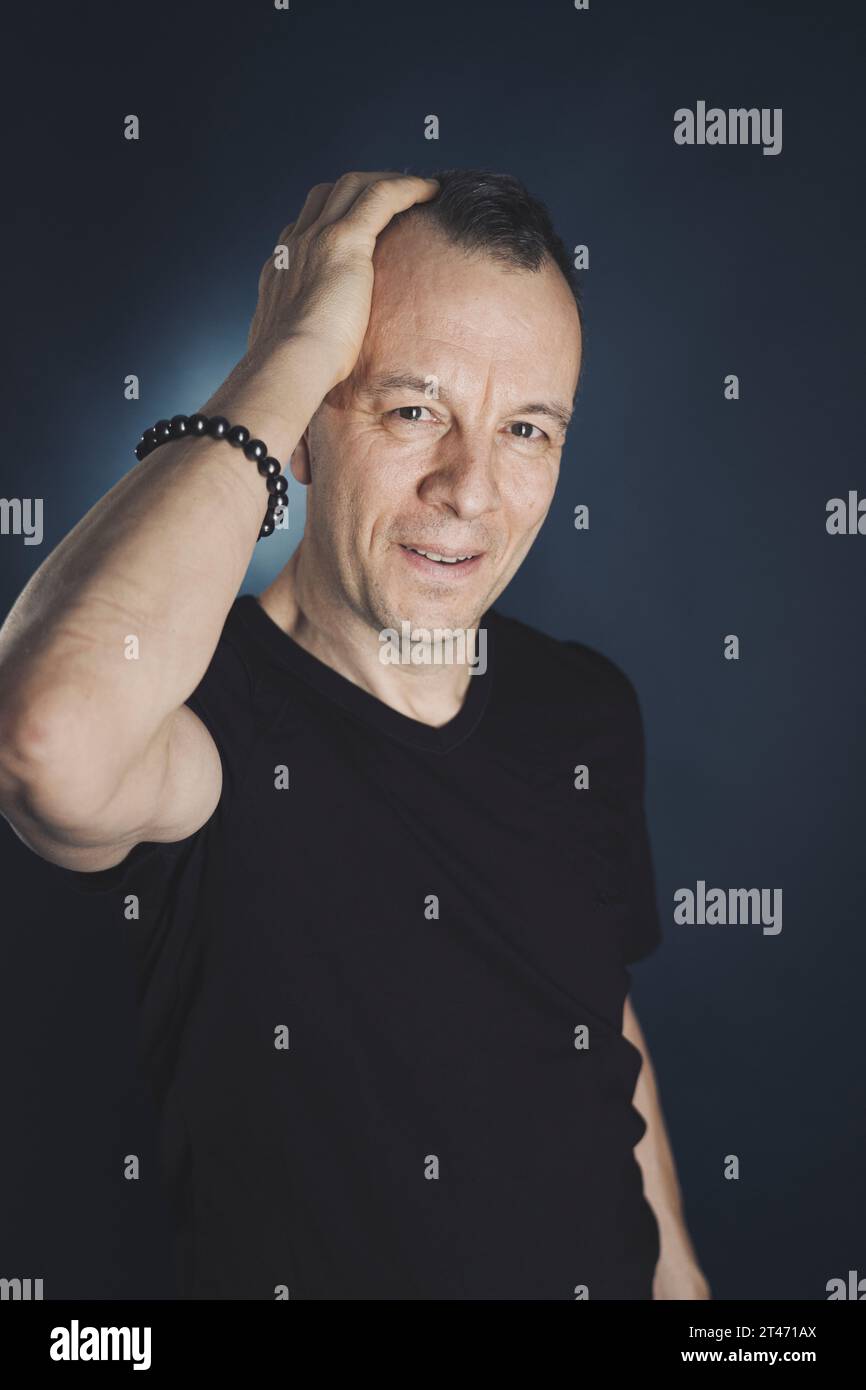 Studio shot man actor model t-shirt photograph posing with creative ...
