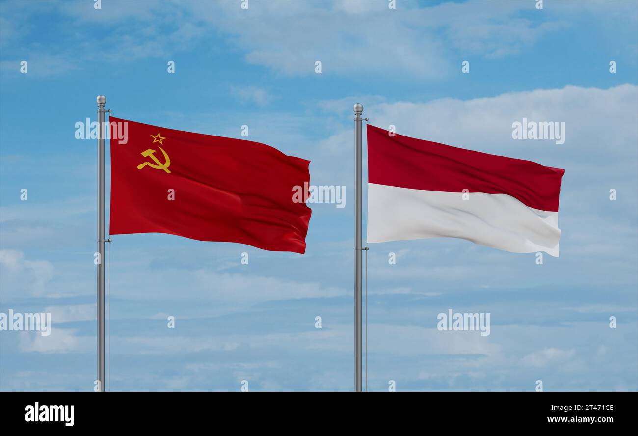 Indonesia and USSR flags waving together on blue cloudy sky, two ...