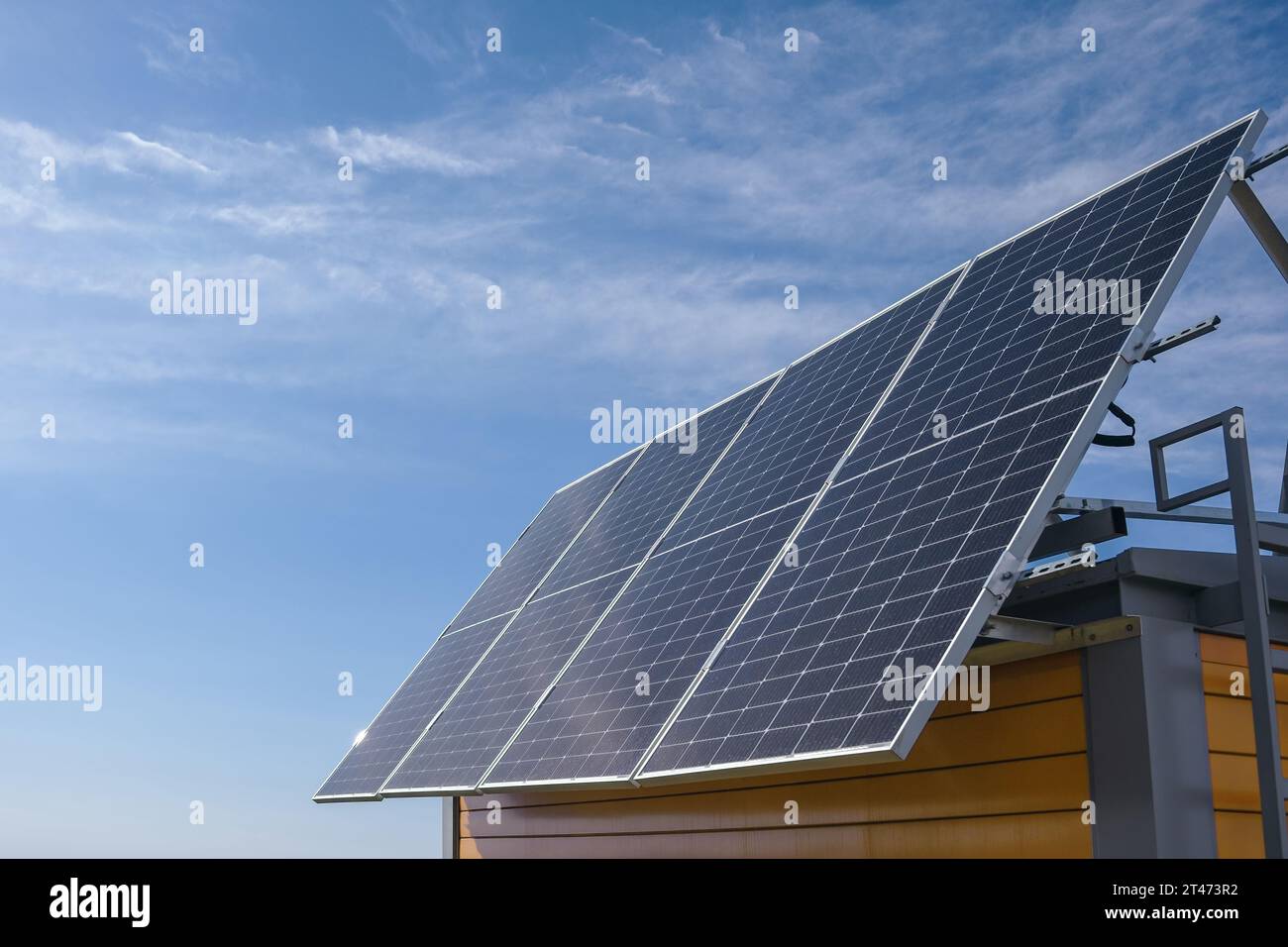 Photovoltaic modules installed on the roof. Green energy Stock Photo ...