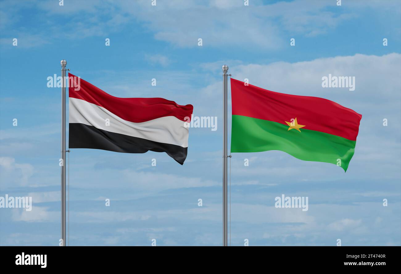 Burkina Faso and Yemen flags waving together on blue cloudy sky, two ...